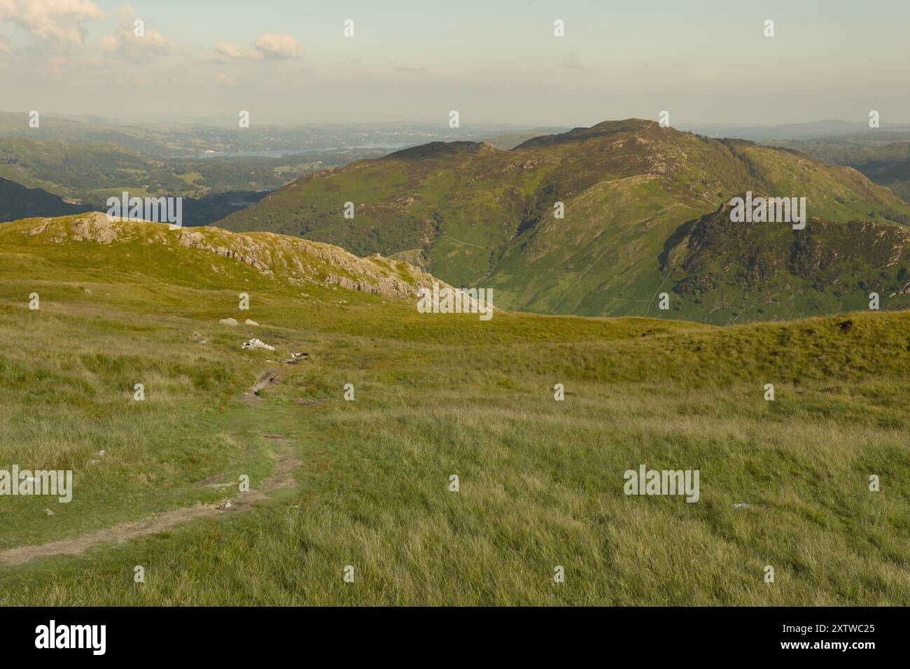 A stunning lanscape sunset in the Lake District across a valley Stock ...