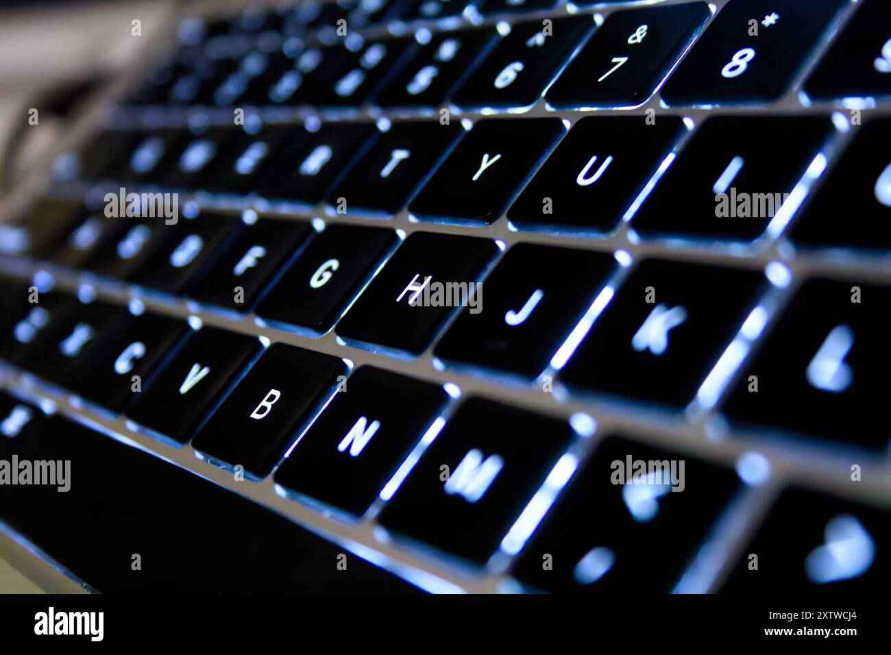 Computer keyboard on blue background. High resolution Stock Photo - Alamy