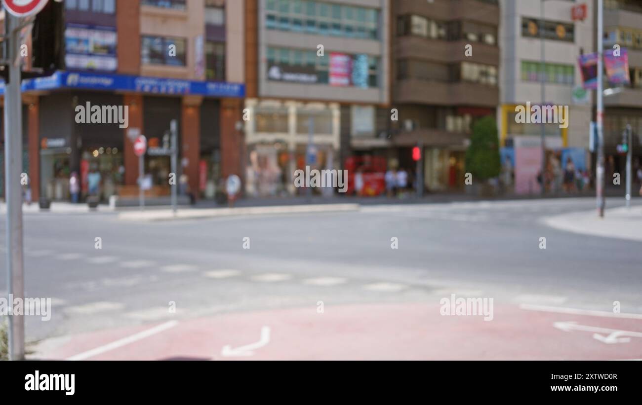 Blurry city street scene with bokeh effect showing defocused buildings ...