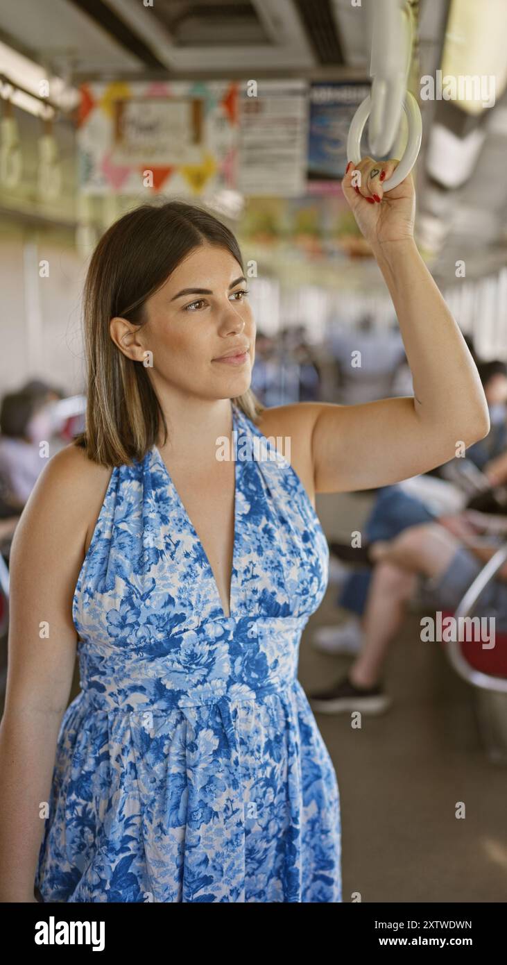 In a modern city's underground, a beautiful hispanic woman enjoys her ...