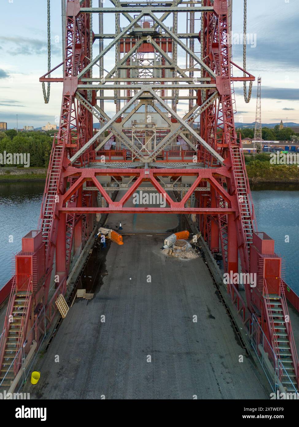 Construction workers are repairing the road surface on a bridge Stock ...