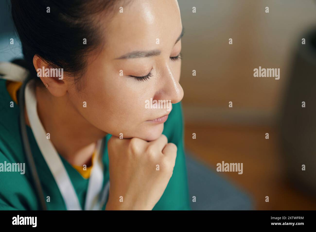 Reflective thinking nurse hi-res stock photography and images - Alamy