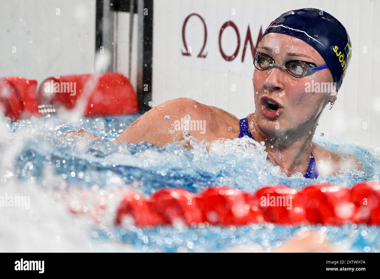 Sarah Sjoestroem of Sweden reacts after competing in the swimming 50m ...