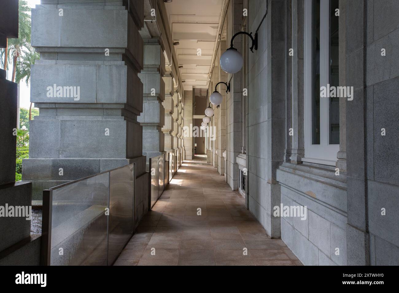 A shaded walkway at The Fullerton Hotel premises, popular landmark ...