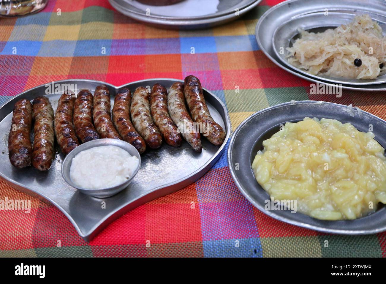 German cuisine: bratwurst (grilled pork sausages), mashed potatoes and ...