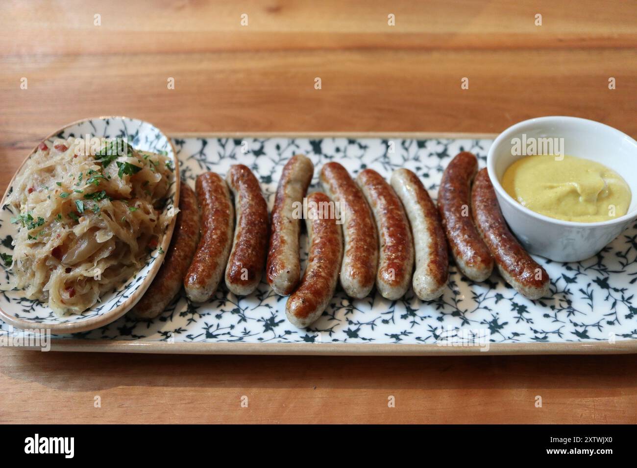 German cuisine: bratwurst (grilled pork sausages) and sauerkraut (sour ...