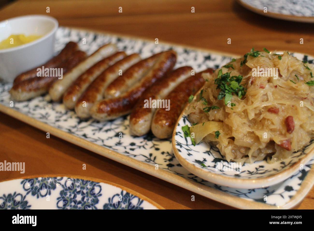 German cuisine: bratwurst (grilled pork sausages) and sauerkraut (sour ...