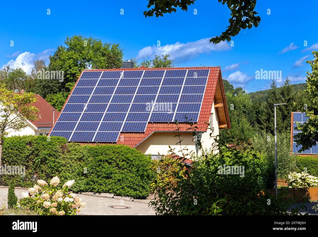 Photovoltaic panels. Ecological houses with modern solar panels on the ...