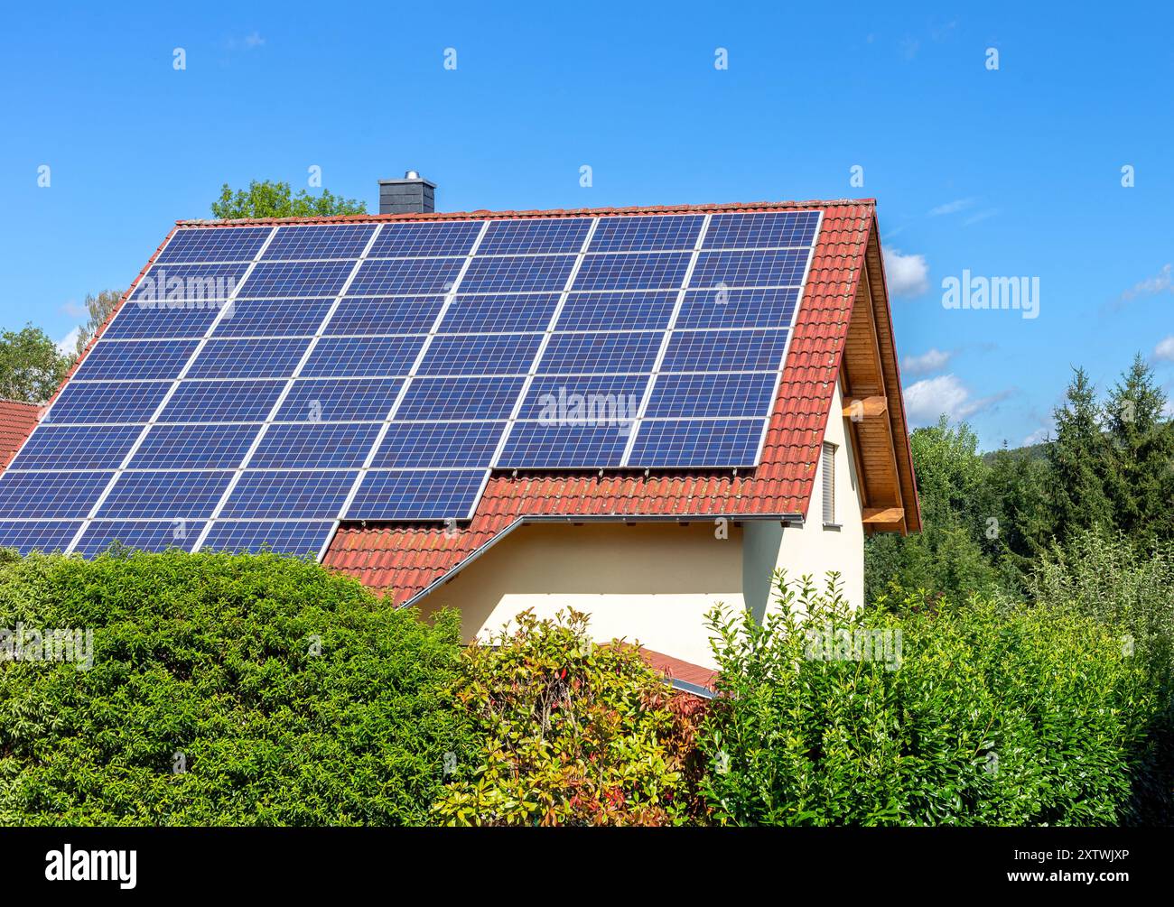 Photovoltaic panels. Ecological houses with modern solar panels on the ...