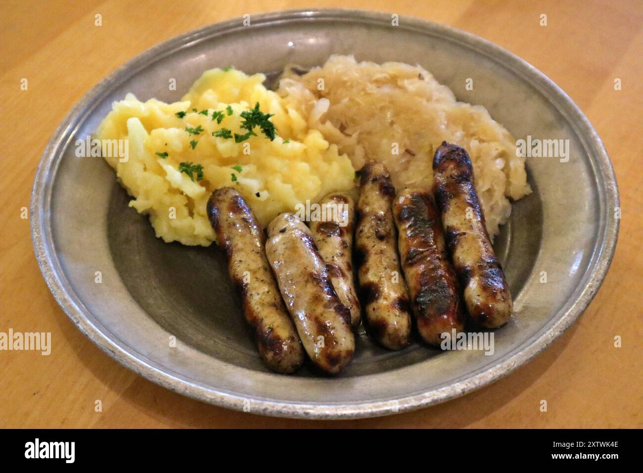 German cuisine: bratwurst (grilled pork sausages), mashed potatoes and ...