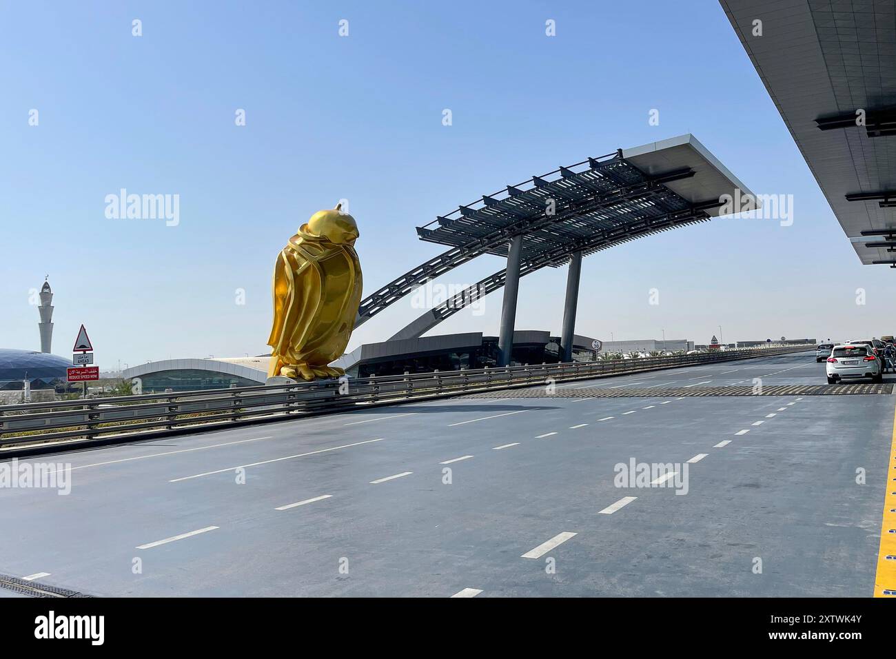 The gold Falcon sculpture, by Tom Claassen, outside of the Hamad ...