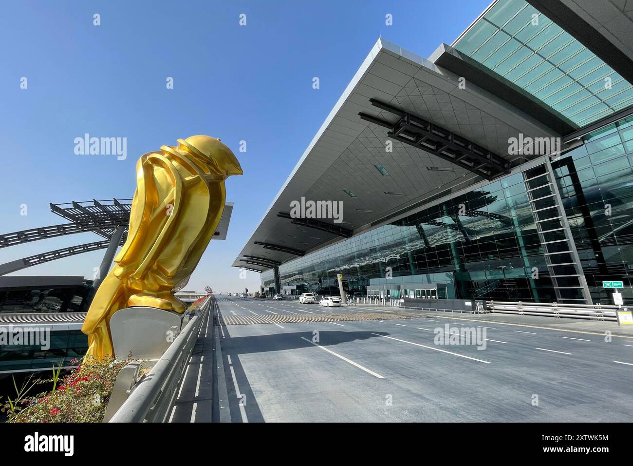 The gold Falcon sculpture, by Tom Claassen, outside of the Hamad ...