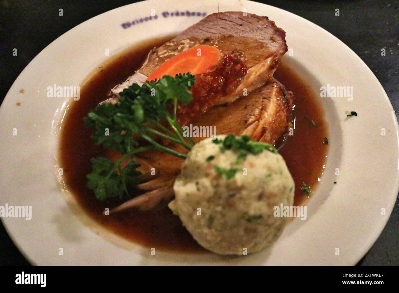 German cuisine: schweinsbraten (roast pork) in Munich, Germany Stock ...
