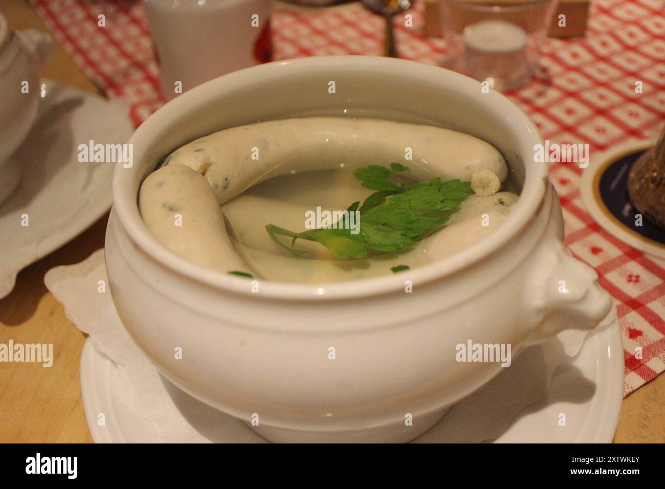 German cuisine: boiled weisswurst (white sausages) in Munich, Germany ...