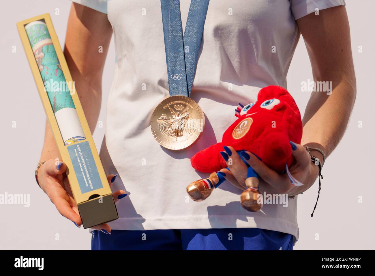 Romanian gymnast Ana Barbosu poses with the bronze medal for her women ...