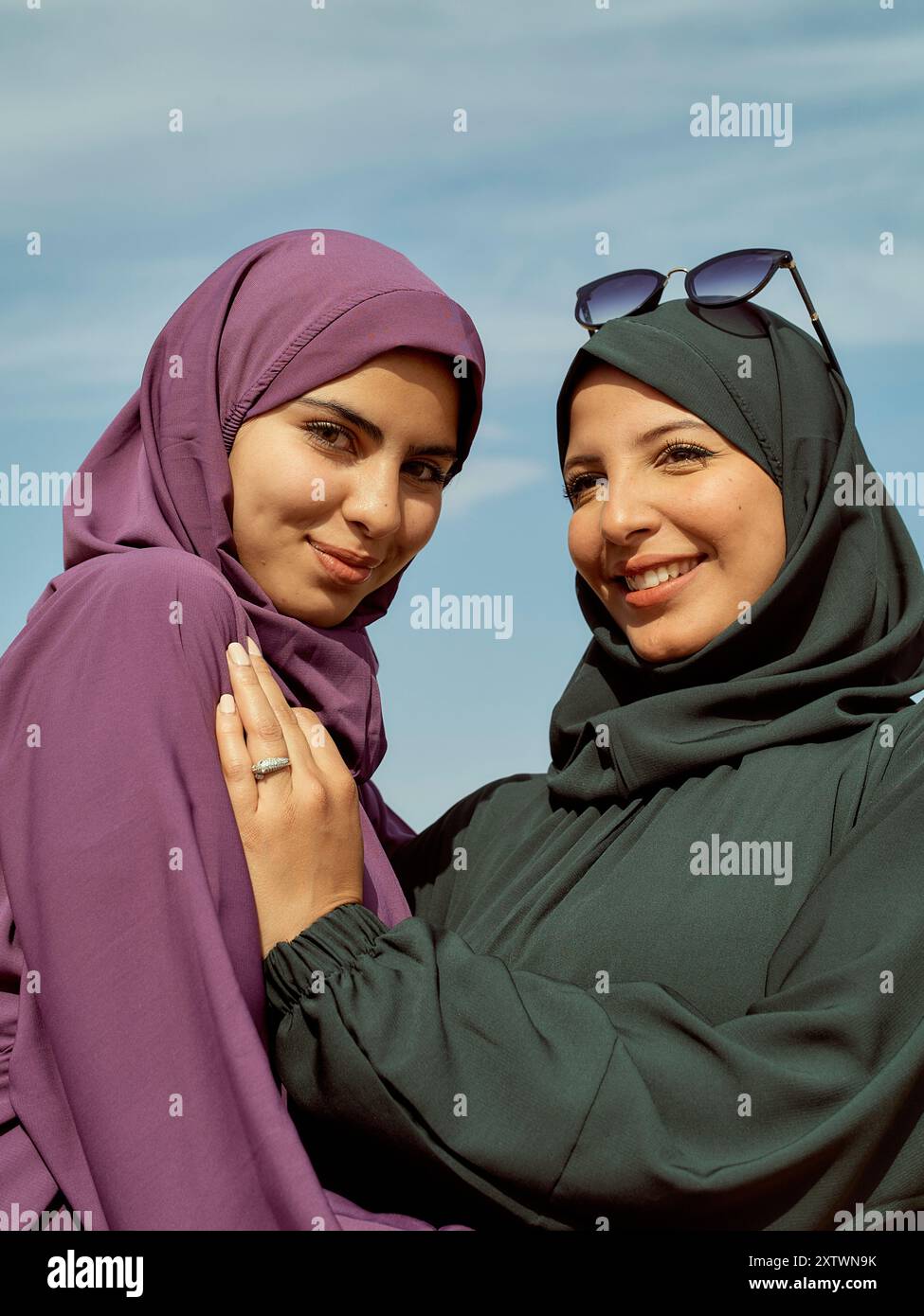 Two muslim women wearing hijab hi-res stock photography and images - Alamy