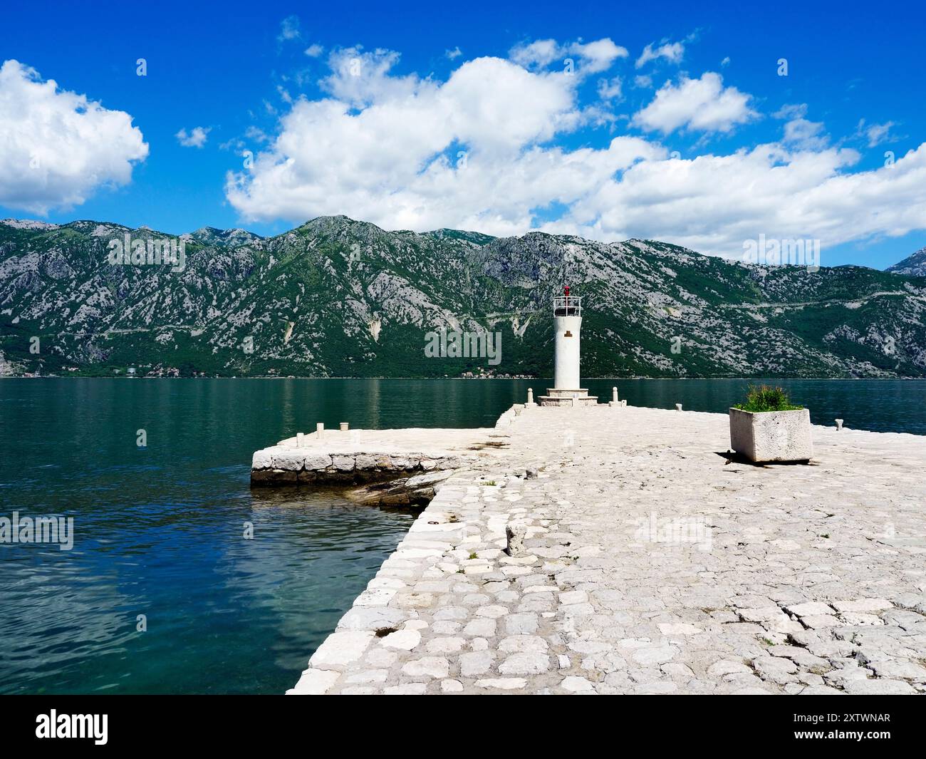 Naval beacon on the island of Our Lady of the Rocks in the Bay of Kotor ...