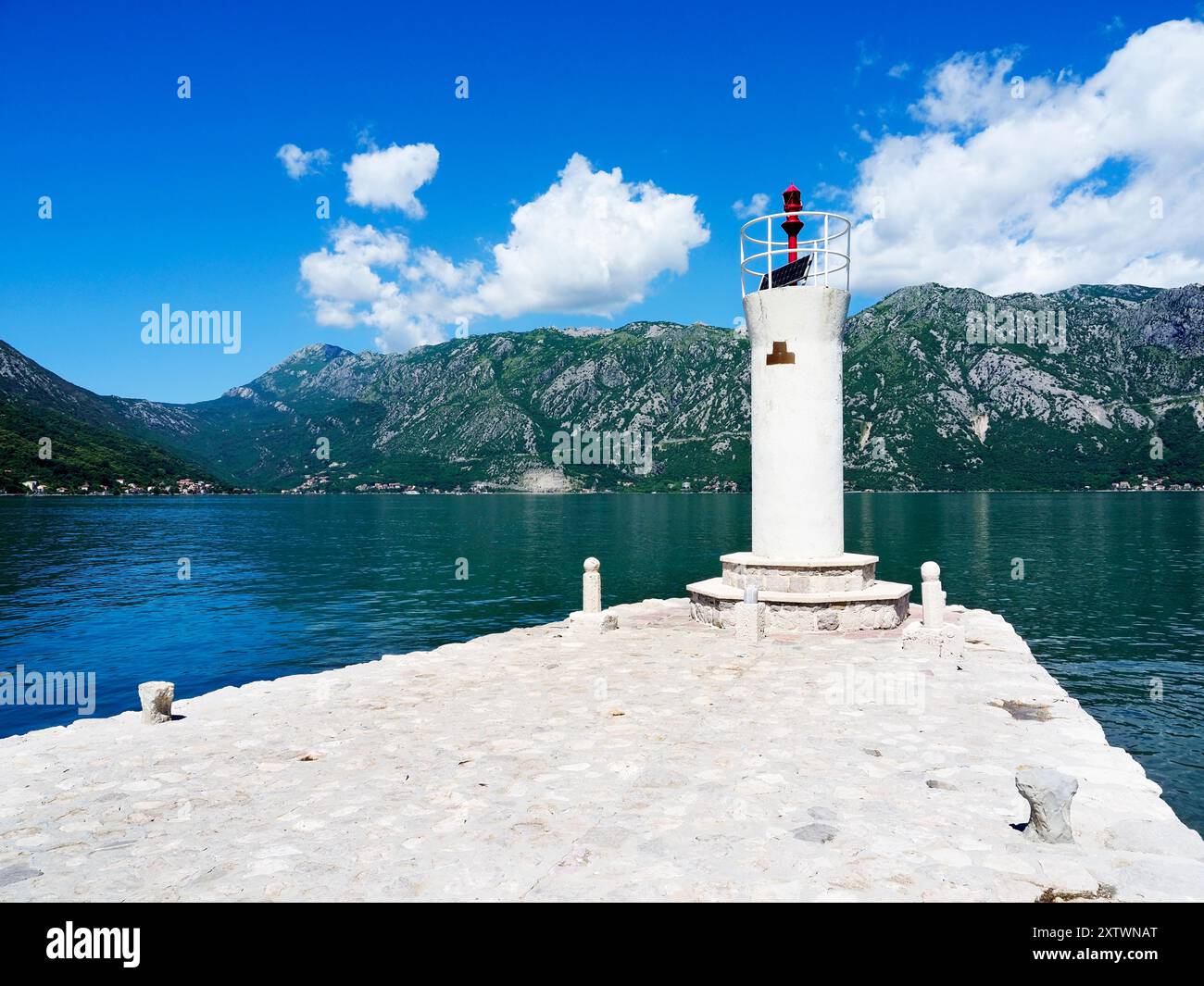 Naval beacon on the island of Our Lady of the Rocks in the Bay of Kotor ...