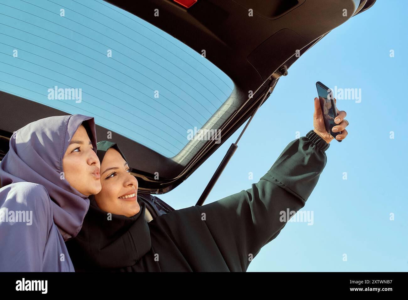 Two women from back hi-res stock photography and images - Alamy