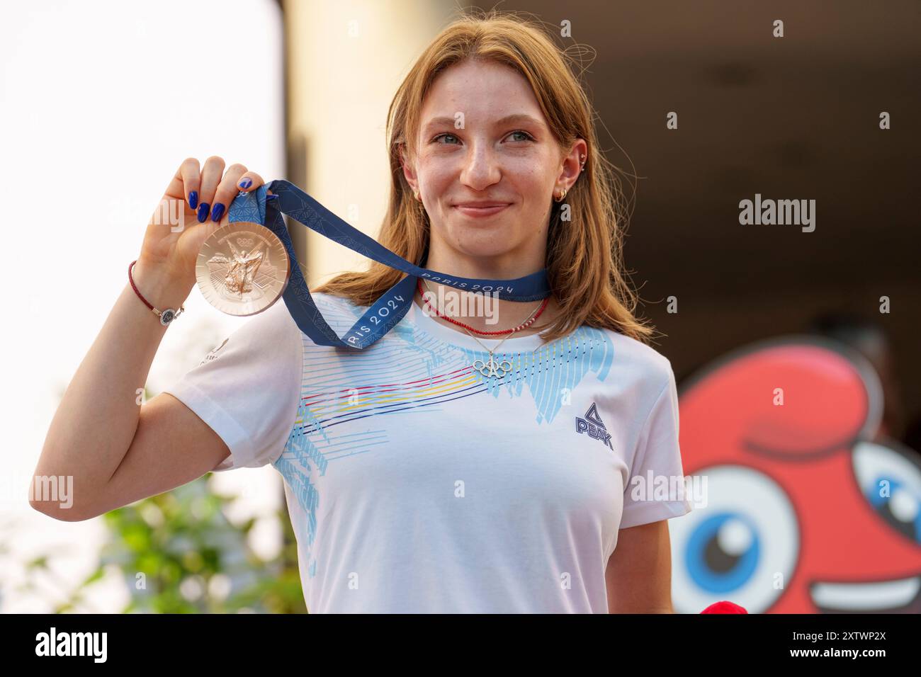 Romanian gymnast Ana Barbosu poses with the bronze medal for her women ...