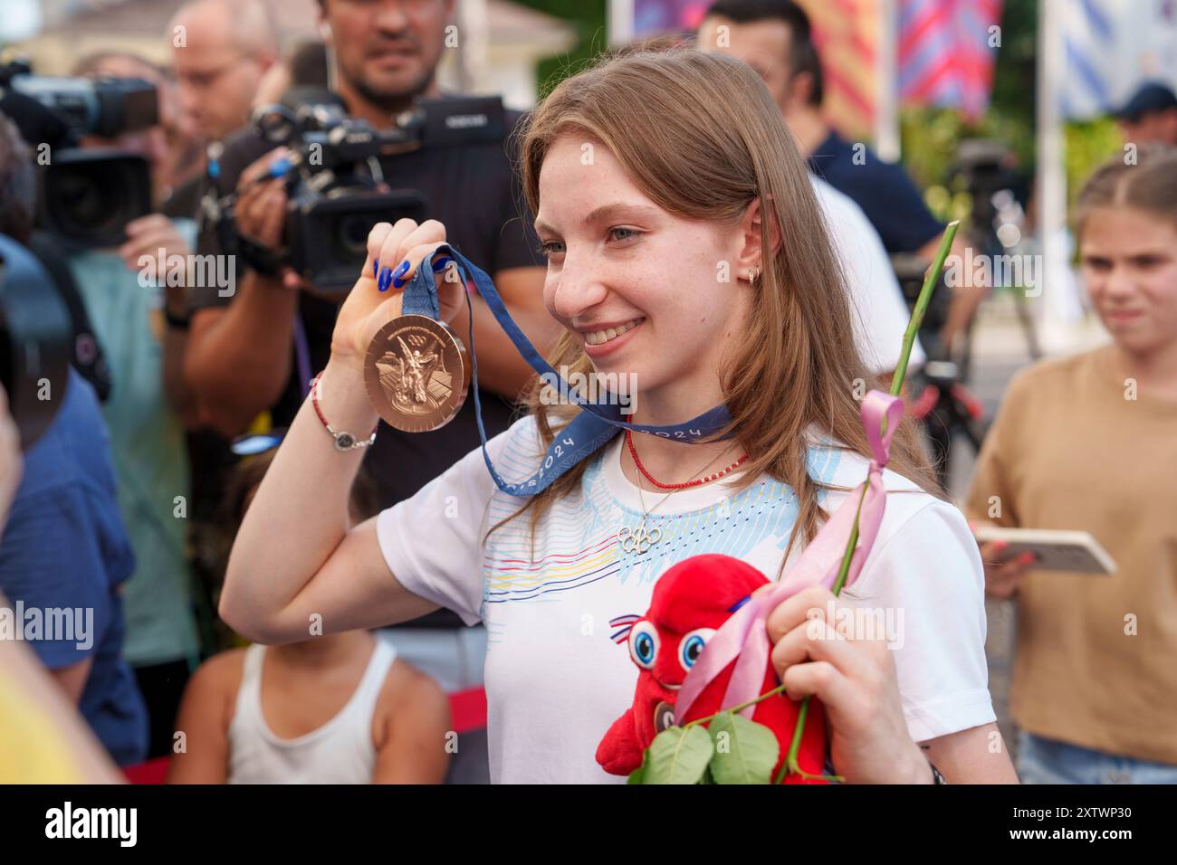 Romanian gymnast Ana Barbosu poses with the bronze medal for her women ...