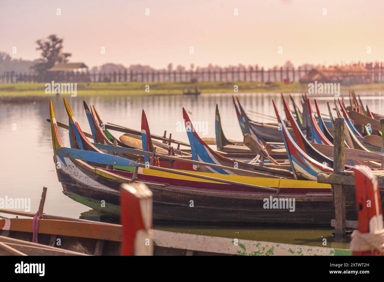 Wooden boats in Ubein Bridge at sunrise, Mandalay, Myanmar (World ...