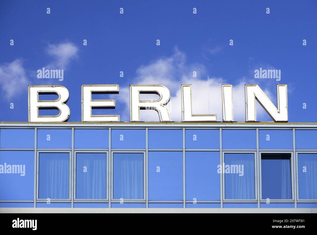Letters of berlin sign in front of blue sky Stock Photo - Alamy