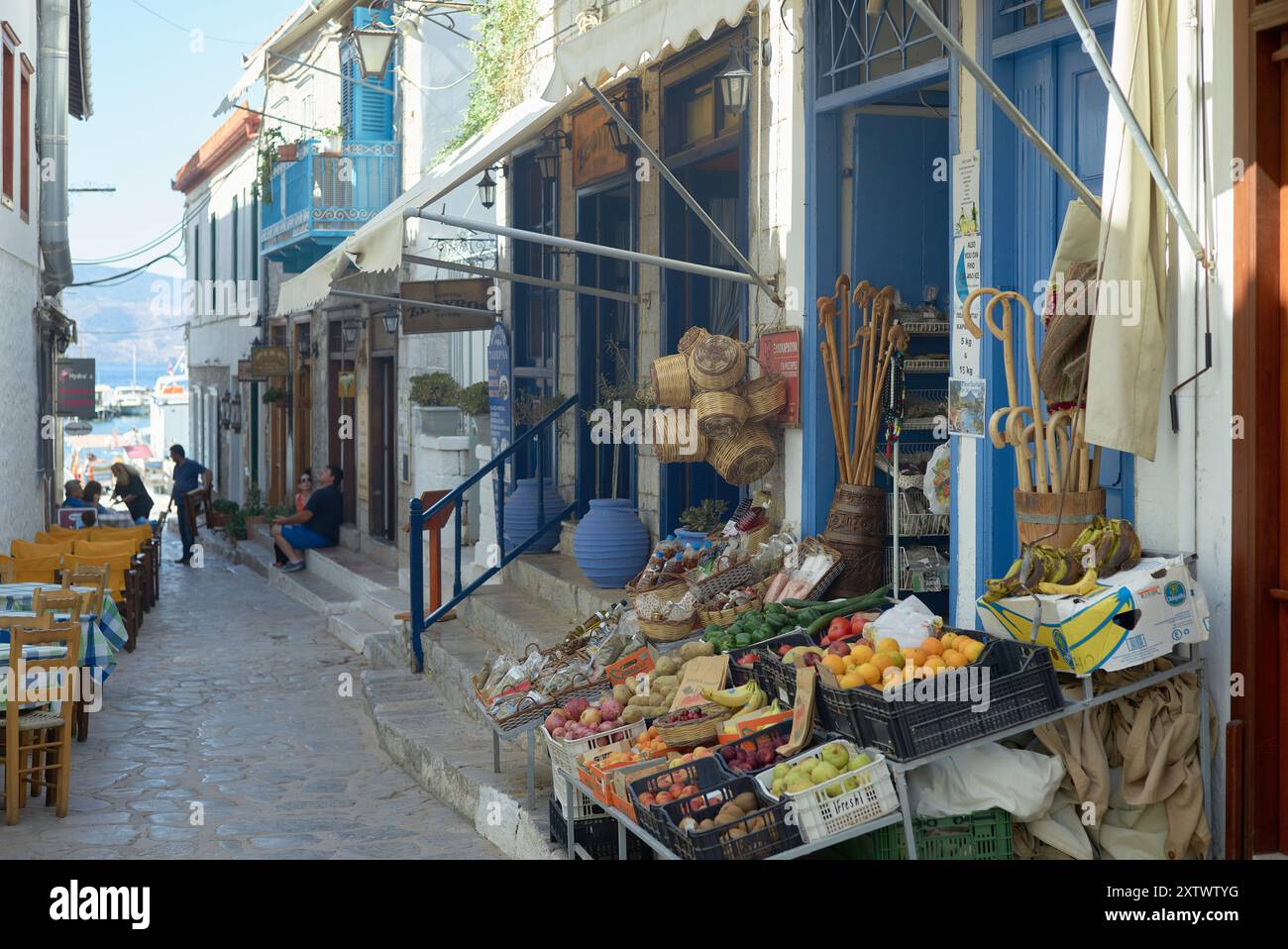 A traditional street market in a Mediterranean town, with fresh produce ...