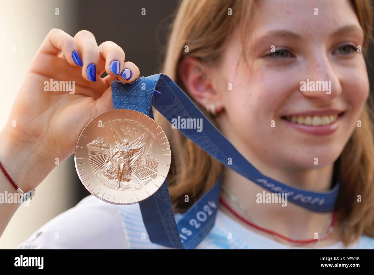 Romanian gymnast Ana Barbosu holds the bronze medal for her women's ...