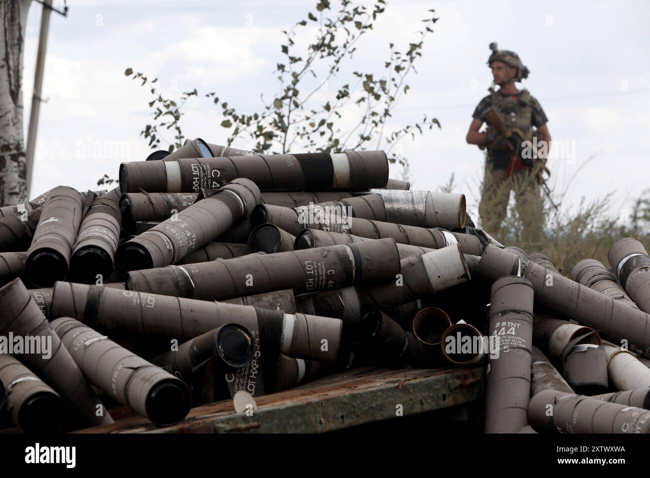 DONETSK REGION, UKRAINE - AUGUST 15, 2024 - An armed soldier stands ...