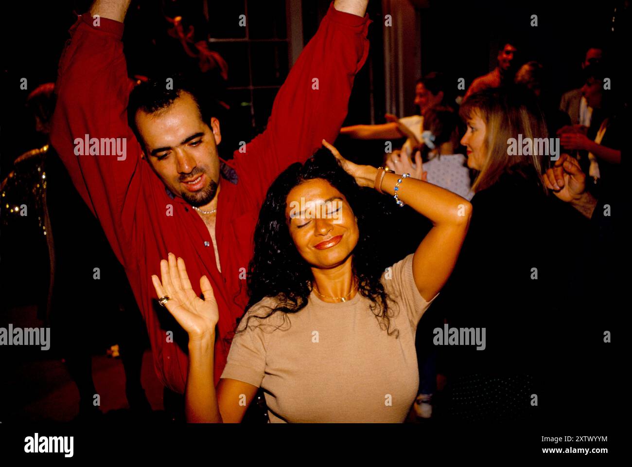 Couple dancing at festival 90s hi-res stock photography and images - Alamy