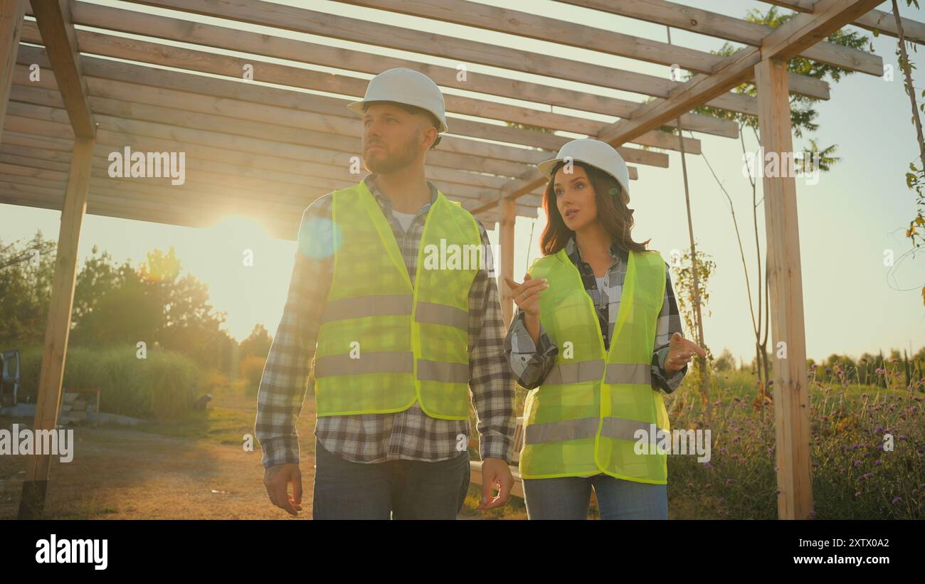 Male engineer walking talking under hi-res stock photography and images ...