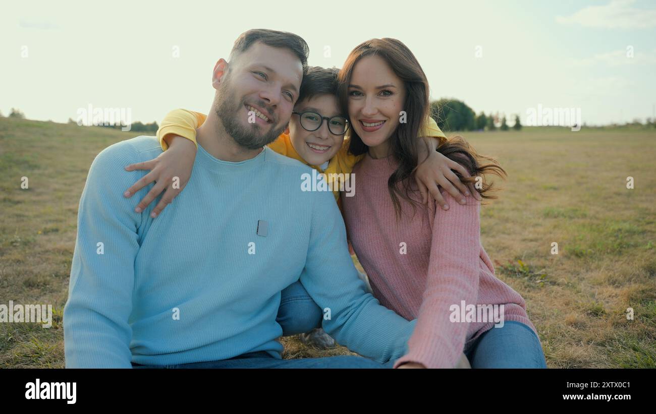 Joyful Caucasian family picnic married couple mother female woman ...