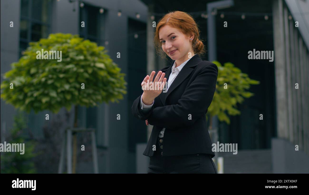 Happy friendly smiling young Caucasian ginger businesswoman recruiter ...