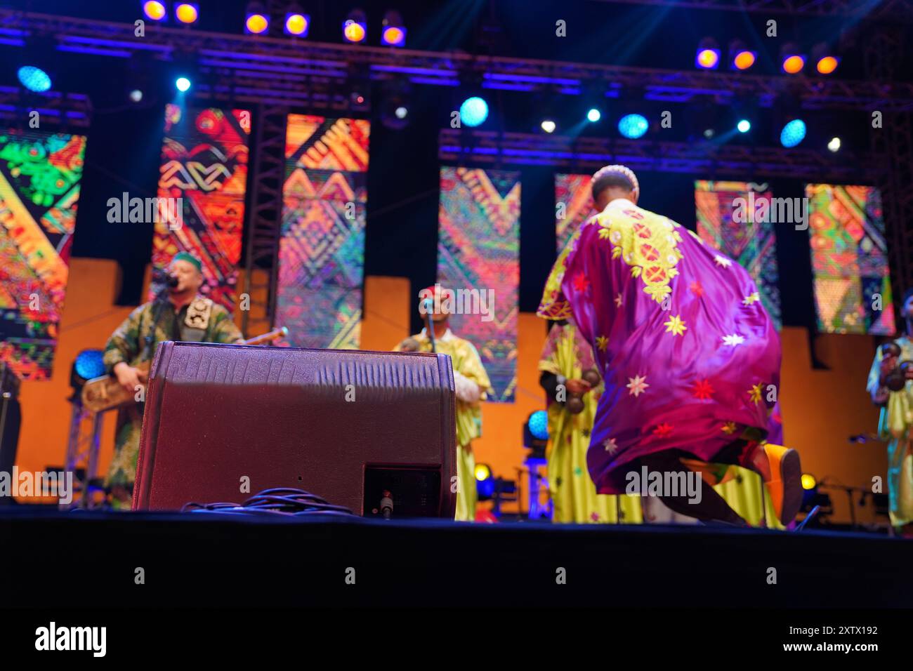 Moroccan musician playing a traditional Moroccan instrument (Qaraqab ...