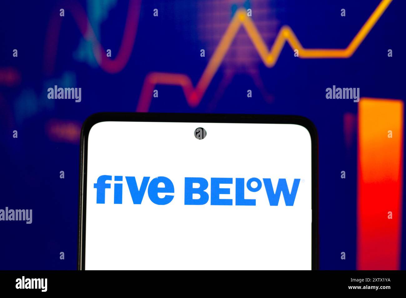 In this photo illustration, the Five Below, Inc. logo is displayed on a ...