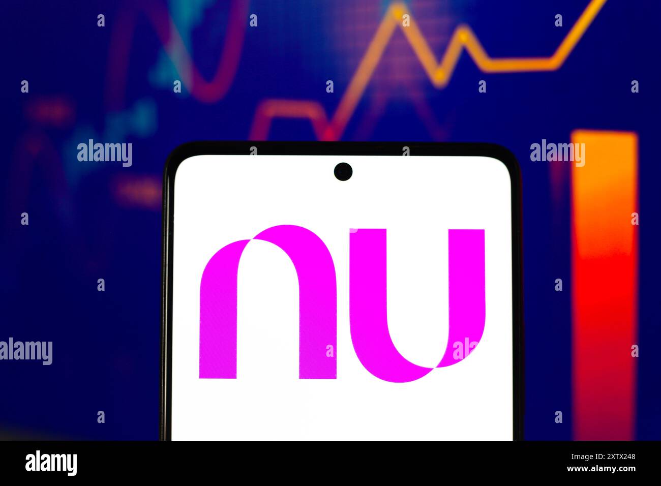 In this photo illustration, the Nu Holdings Ltd. logo is displayed on a ...