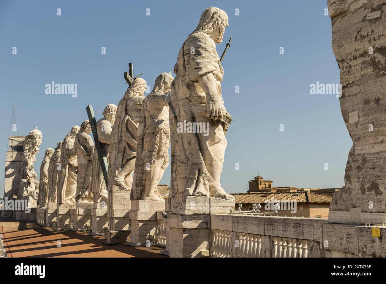 Back view of statues of the saints apostles located on the top of Saint ...