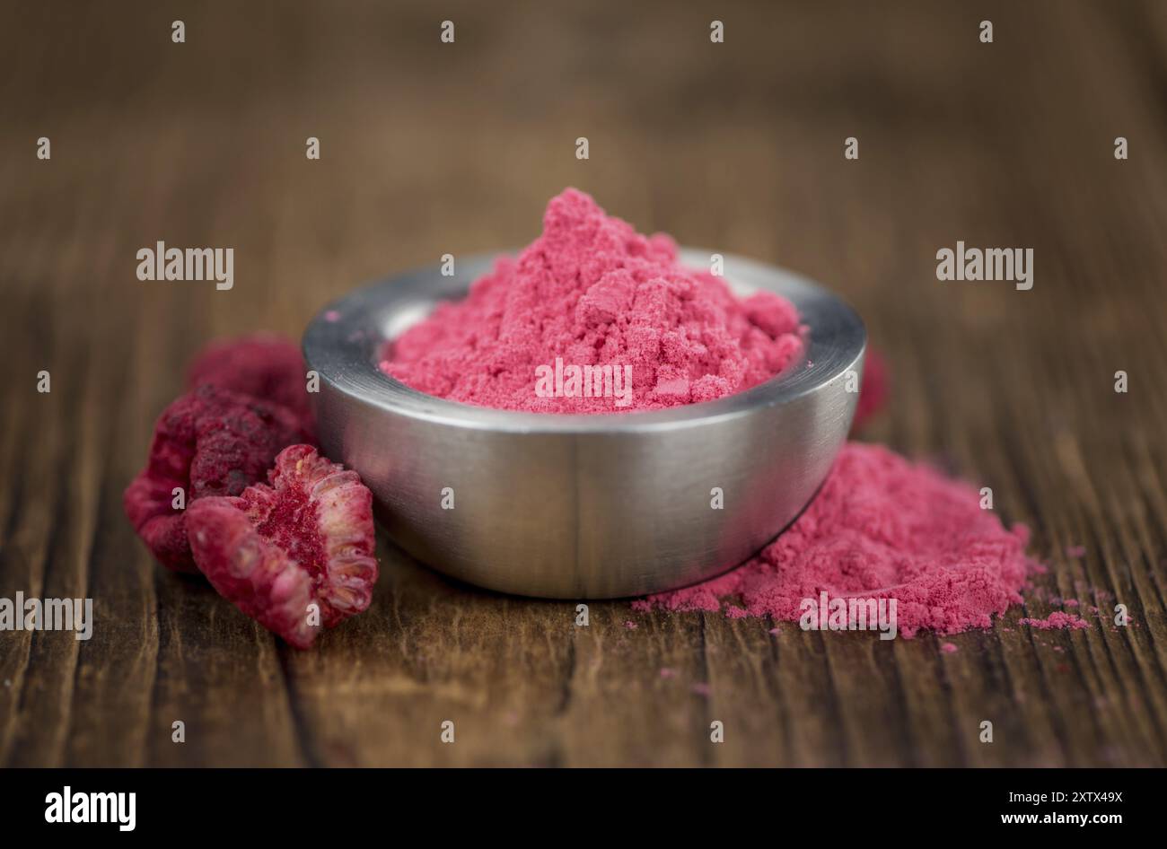 Fresh made Raspberry powder on a vintage background as detailed close ...