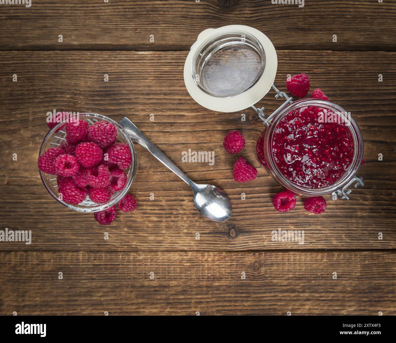 Fresh made Raspberry Jam on a vintage background as detailed close-up ...