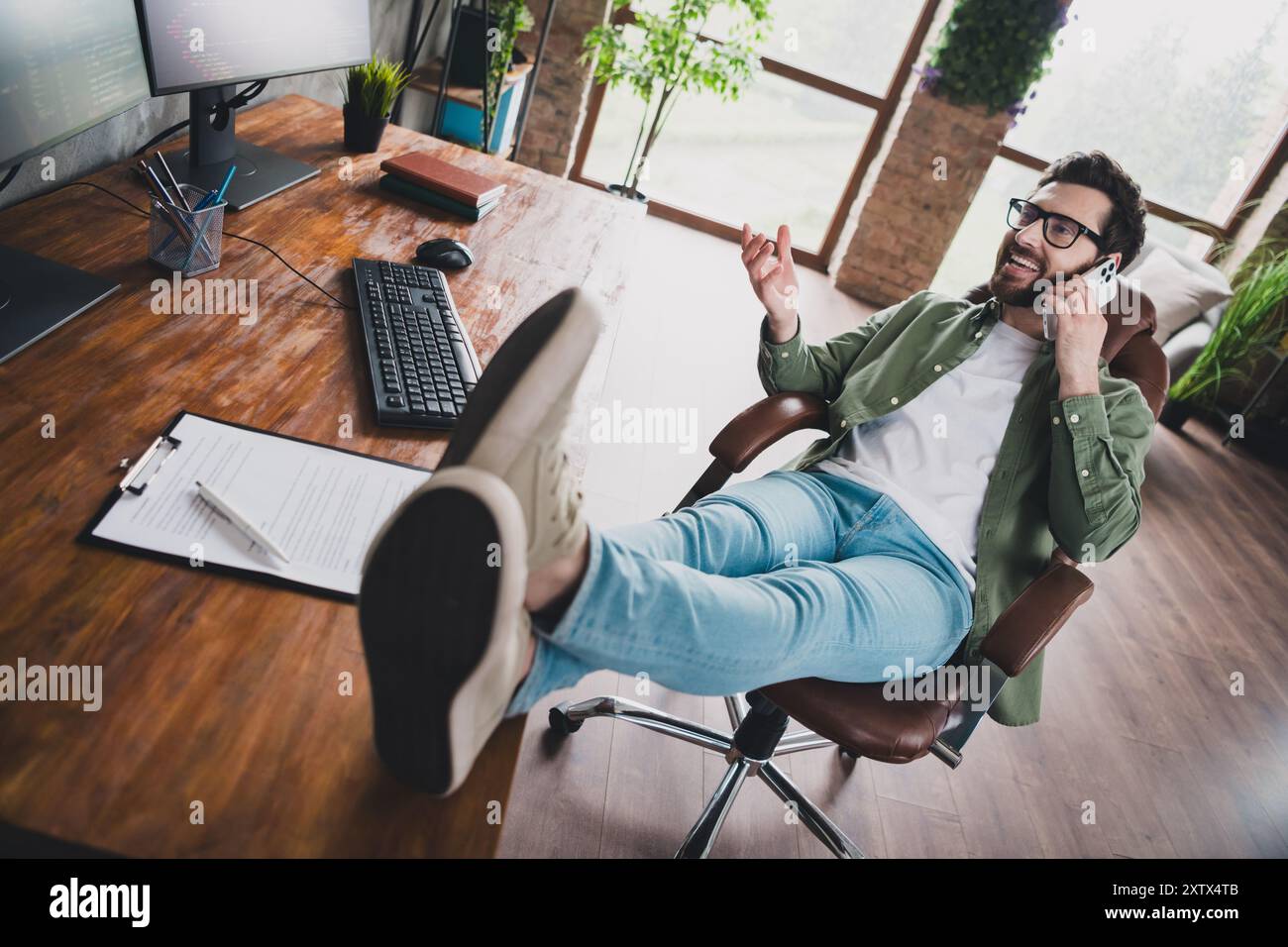 Full body portrait of professional hacker young man speak telephone ...