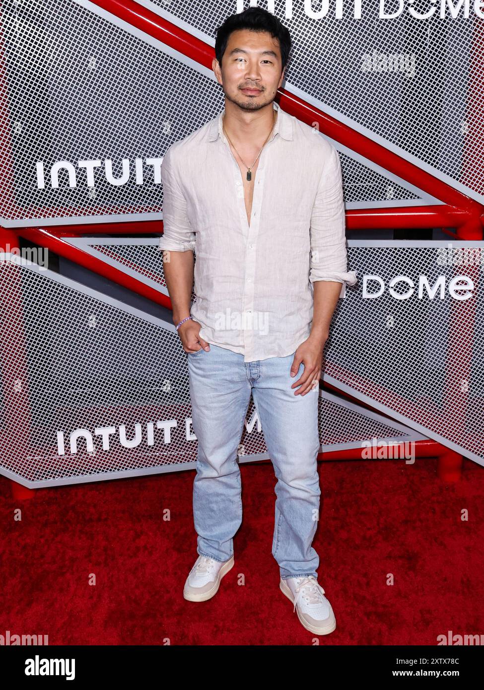 INGLEWOOD, LOS ANGELES, CALIFORNIA, USA - AUGUST 15: Simu Liu arrives ...