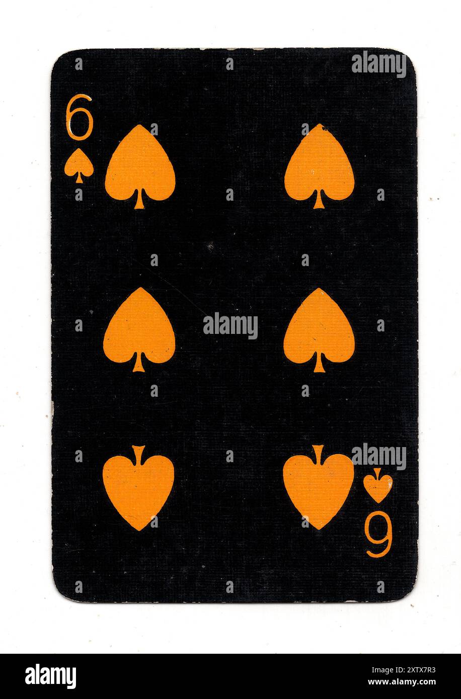 A vintage black six of spades playing card isolated on a white ...