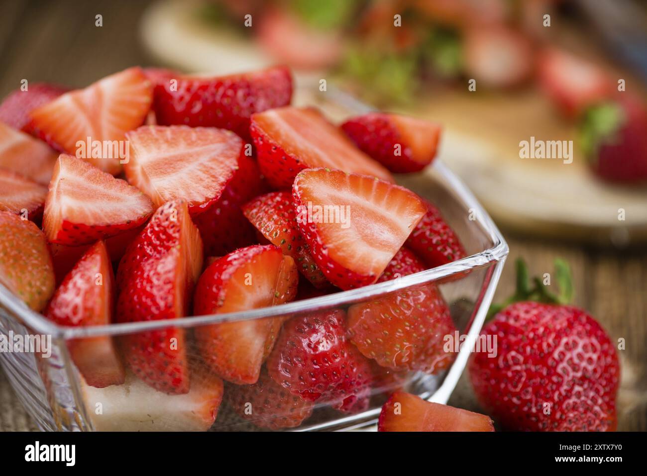 Strawberries (Chopped) on a vintage background as detailed close-up ...