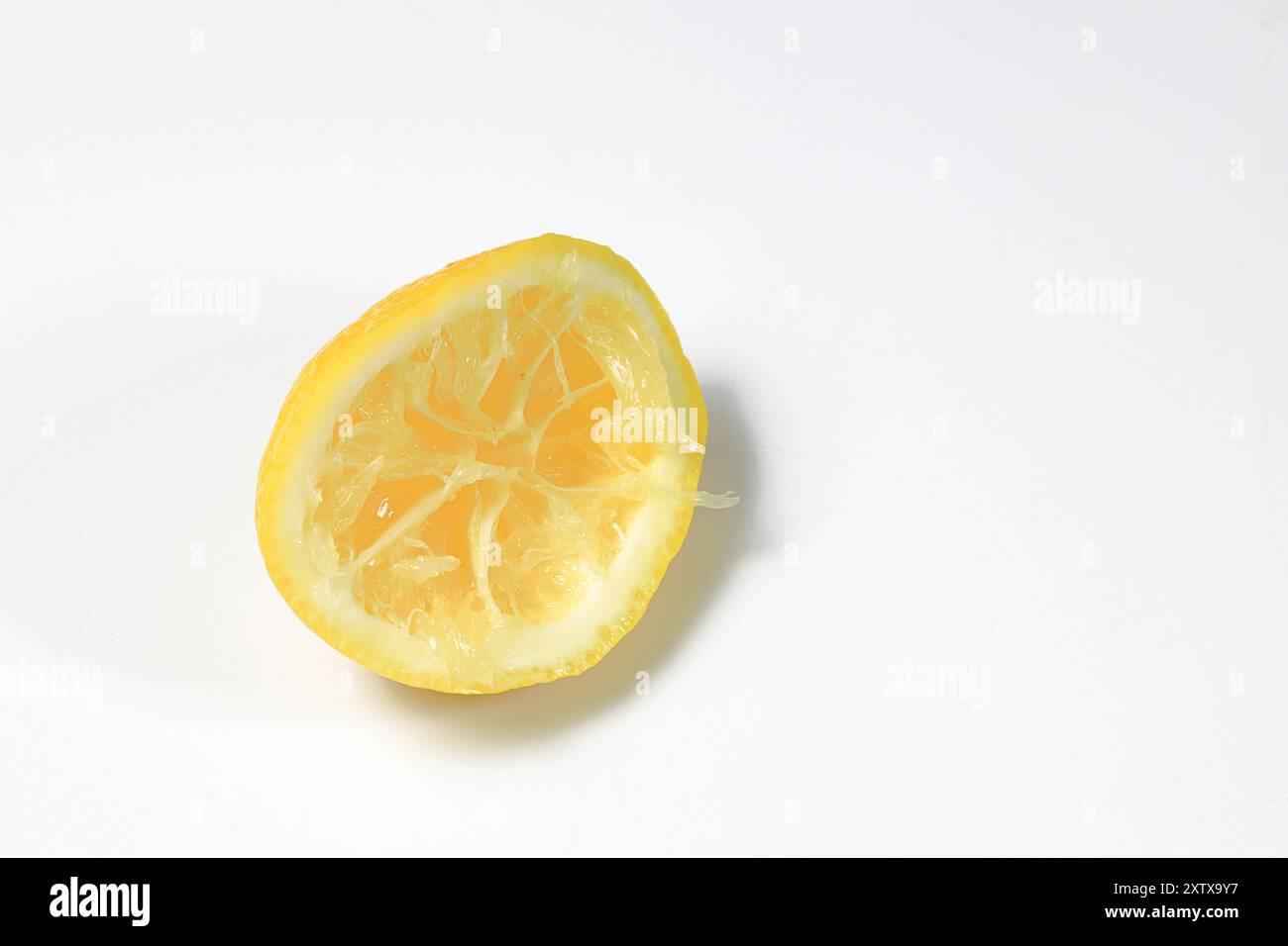 Fresh squeezed lemon fruit isolated on white background Stock Photo - Alamy