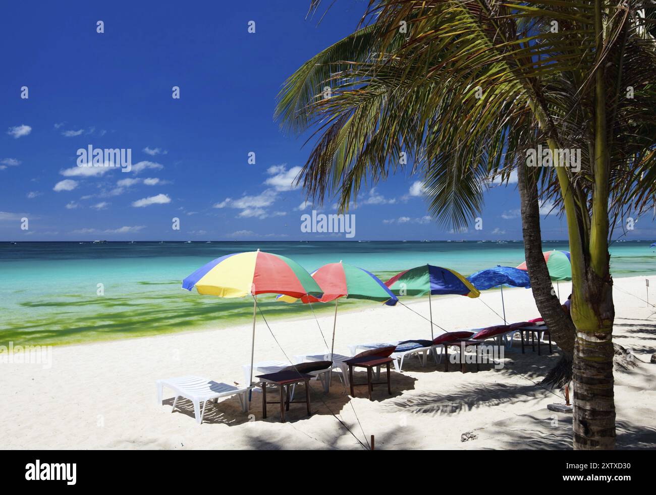 Beach with Palm trees and deckchair on Boracay, island, Philippines ...
