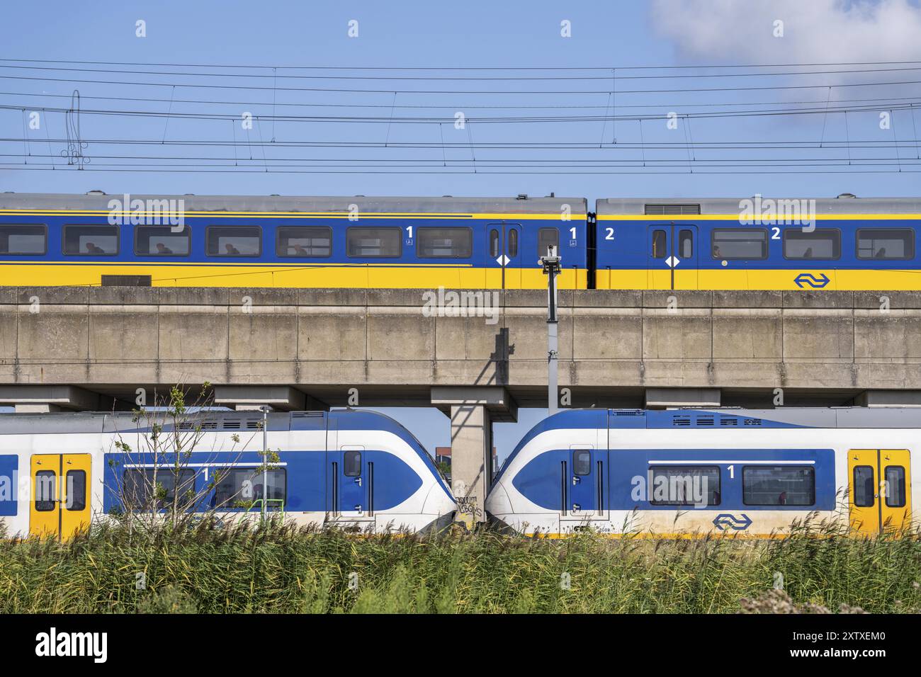 Trains of the Dutch railway, NS, Nederlandse Spoorwegen N.V., on a ...