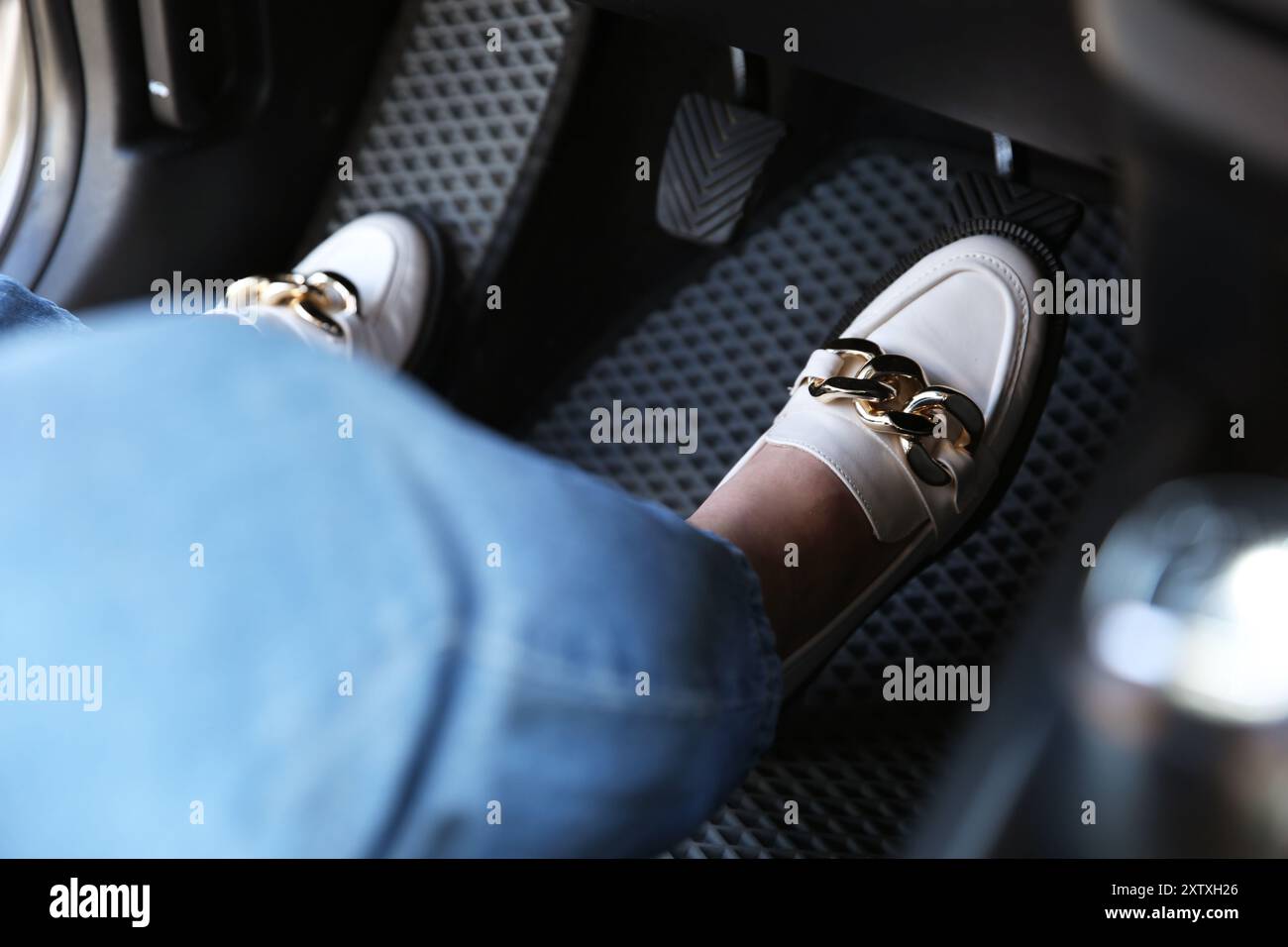 Woman in driving car legs hi-res stock photography and images - Alamy
