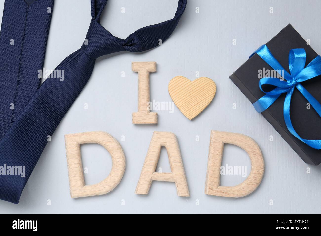 Happy Father's Day. Phrase I love Dad made with wooden letters, gift ...