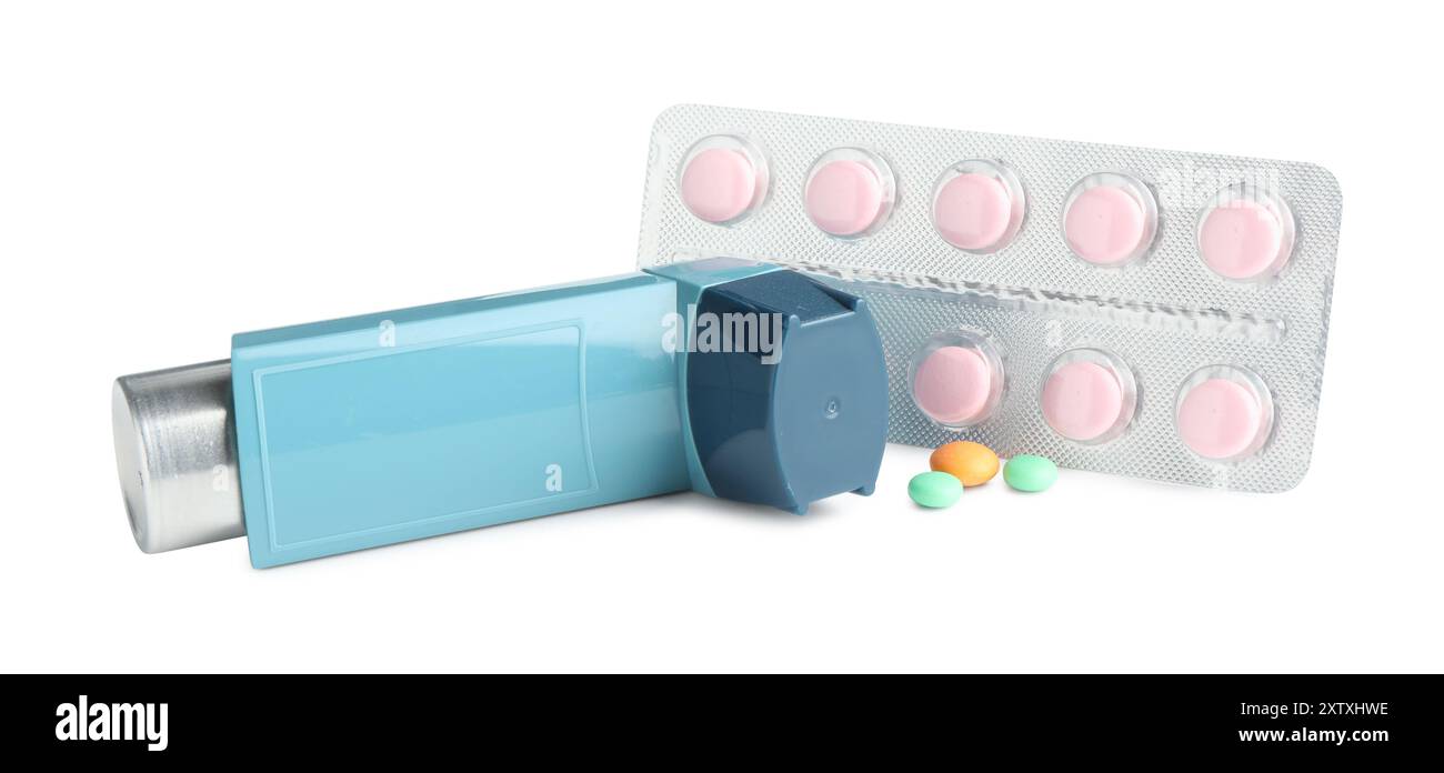 Asthma treatment. Inhaler and pills isolated on white Stock Photo - Alamy